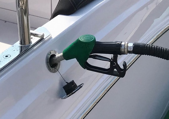 What do you need to know about your boat's fuel tank and refueling?